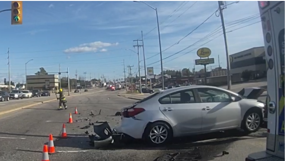 Multiple charges after commercial truck runs red light and crashes into ...